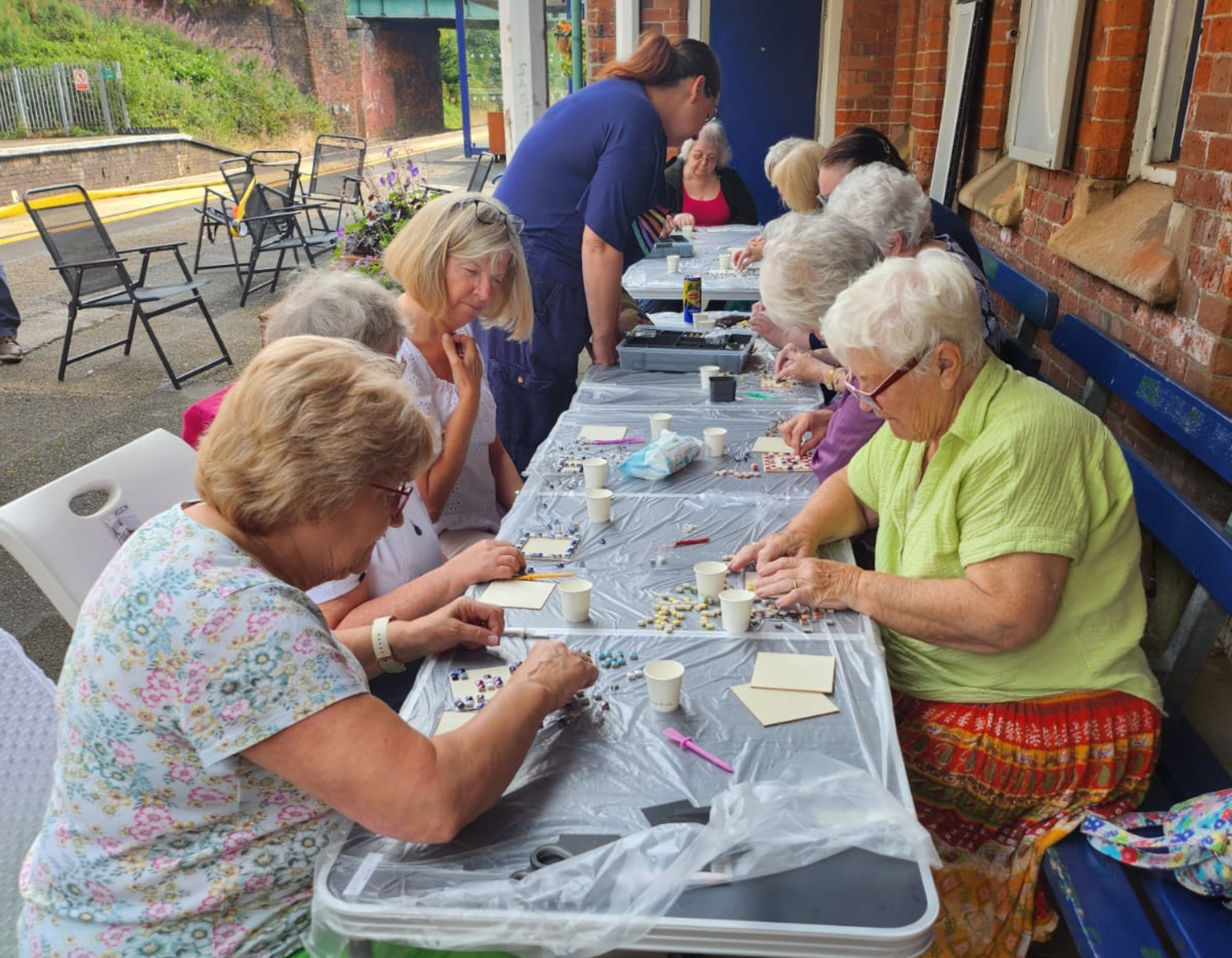 Volunteers set up 'craft station' to combat social isolation in ...
